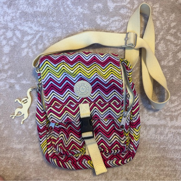 Kipling | Bags | Kipling Crossbody Pink And Yellow Sloth Keychain ...